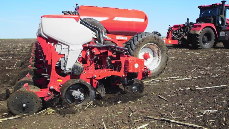 4K. Tractor with a Sowing Complex Works in the Field Stock Footage ...