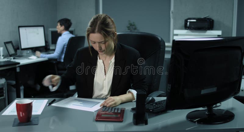 4K: Two Female Employees are Working on Her Computers in a Modern ...
