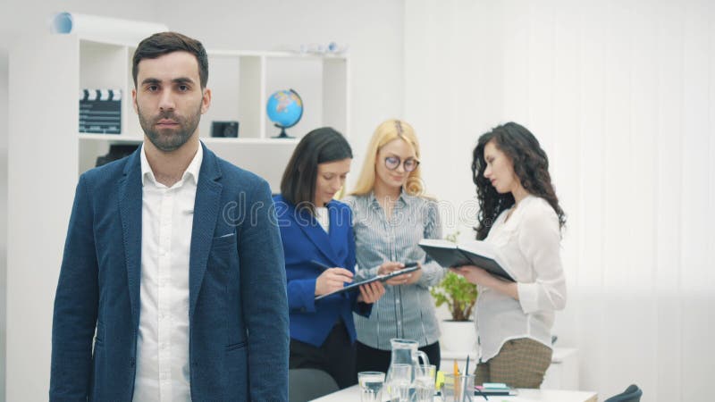 4k Video of Boss Standing Delighted in Front of His Workers. Stock ...