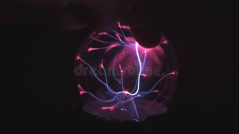 A Hand Touching the Surface of Electric Plasma Ball. Slow Motion Stock ...