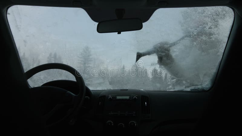 4K Woman Scraping Windshield from Inside Stock Footage - Video of clean ...