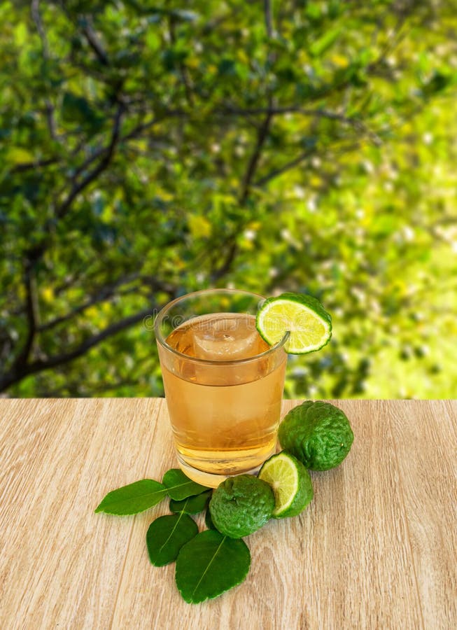 Kaffir Lime Tea and Leaves on a Wooden Table Stock Image - Image of ...