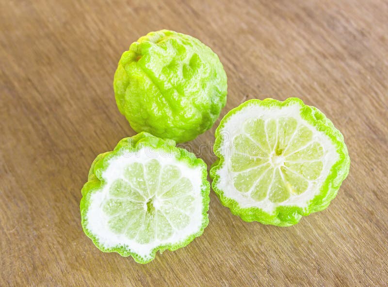 Kaffir Lime on Wooden Table Stock Image - Image of organic, citron ...