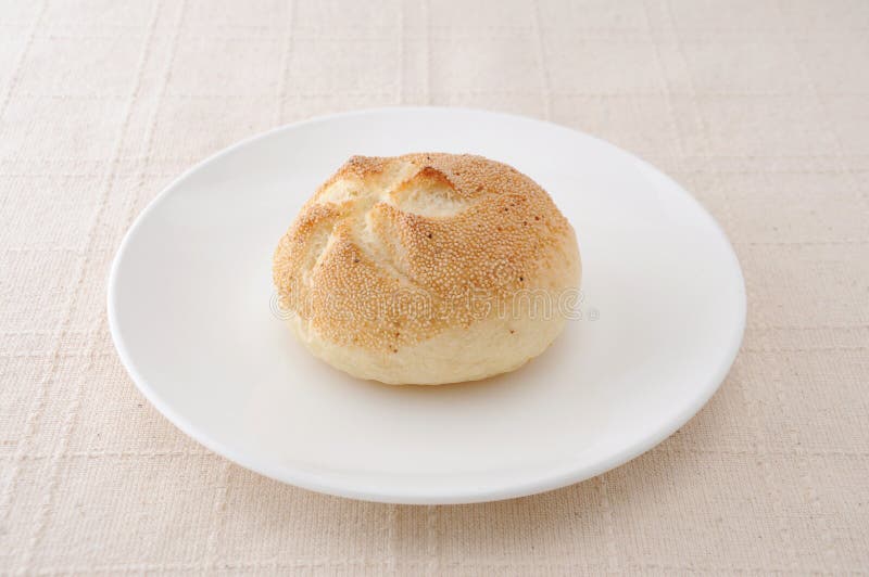 Kaiser Roll German Bread on a Plate on Table Cloth Stock Image - Image ...