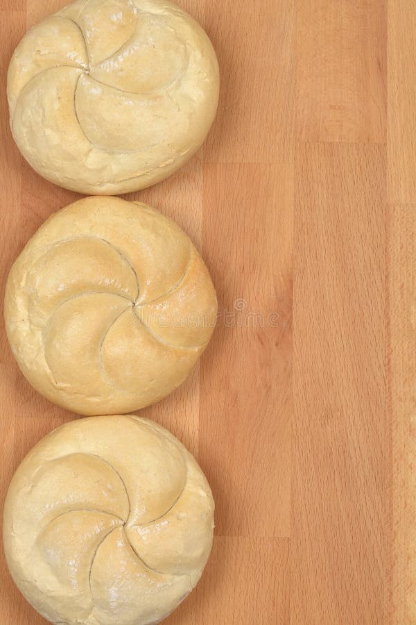Kaiser rolls stock image. Image of grain, wooden, arranged - 375254463