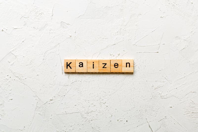 Kaizen Word Written on Wood Block. Kaizen Text on Table, Concept Stock ...