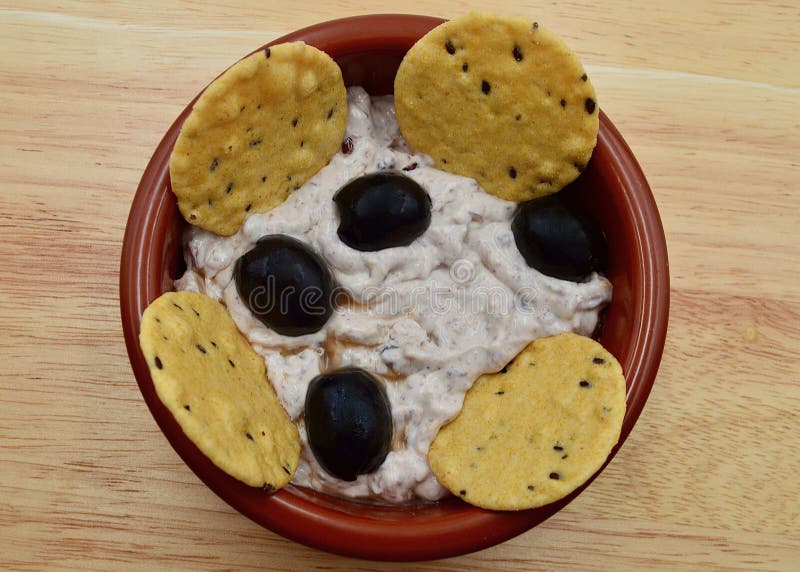 Kalamata Olive Dip with Rice Crackers and Black Olives Stock Photo ...