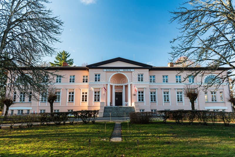 Kalvene Manor with Flags in Sunny Autumn Day, Latvia Editorial Stock ...