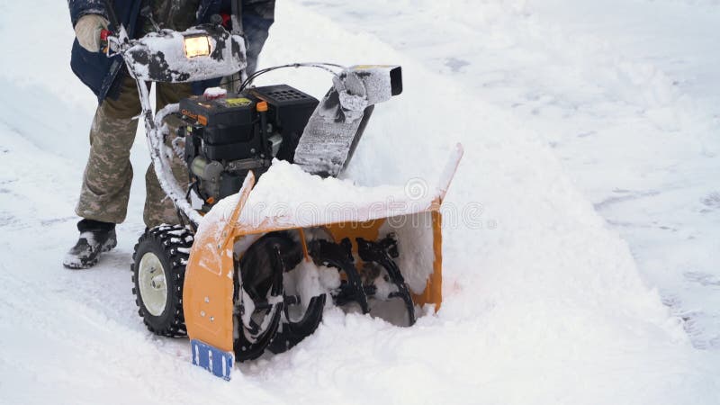 Using Snow Blower Machine, Clear Snow from Driveway after a Winter ...