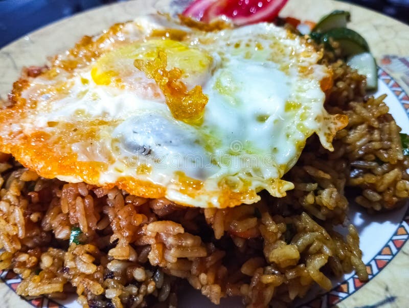 Kampong Fried Rice with Pickles, Egg and Tomato. Stock Image - Image of ...