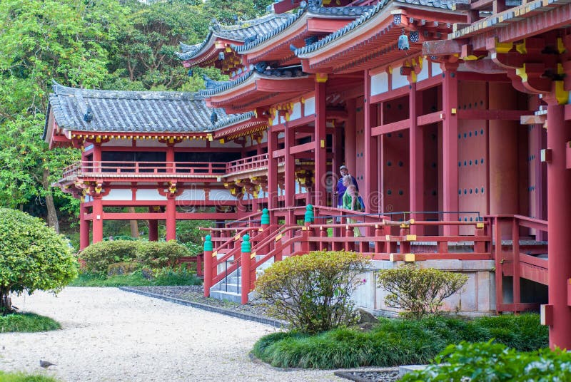 Kaneohe, Hawaii - May 02, 2015: Tourist Enjoying the Byodo in Temple in ... Kaneohe, Hawaii - May 02, 2015: Tourist Enjoying the Byodo in Temple in ...