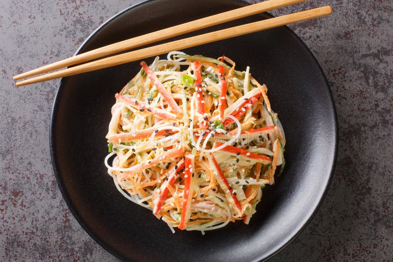 Kani Salad Made Of Crab Meat And Julienne Vegetables All Doused In A Sweet Spicy And Creamy