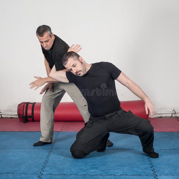 Kapap Instructor Demonstrates Arm Lock Techniques Stock Image - Image ...
