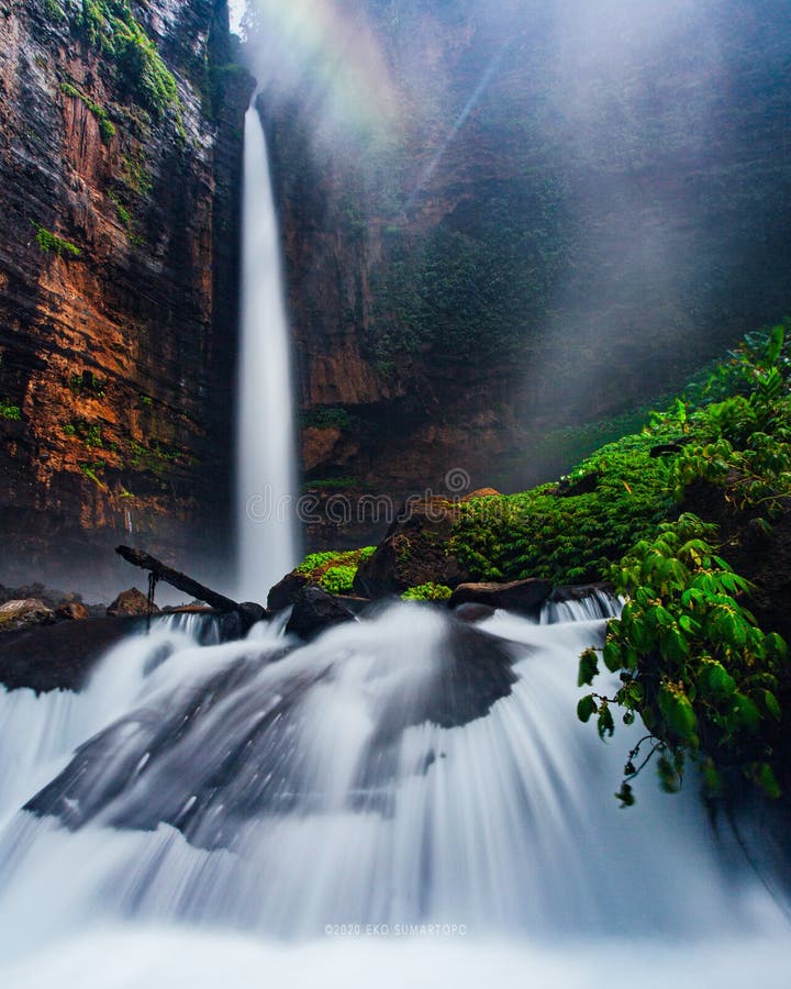Kapas biru waterfall stock image. Image of kapas, located - 200460907
