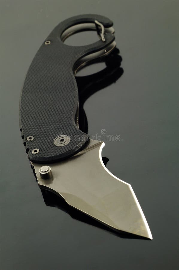 Karambit on black stock image. Image of danger, karambit - 10858255