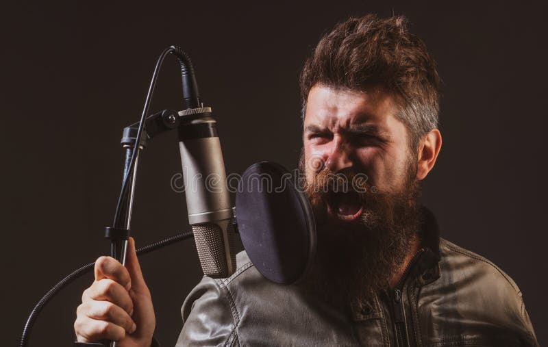Karaoke Singer. Man Singing with Music Microphone. Stock Photo - Image ...