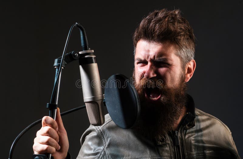 Karaoke Singer. Man Singing with Music Microphone. Stock Photo - Image ...