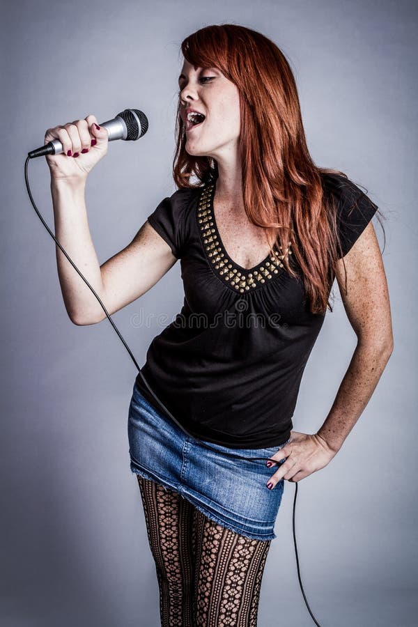 Karaoke Singing Girl stock photo. Image of karaoke, gorgeous - 98551410
