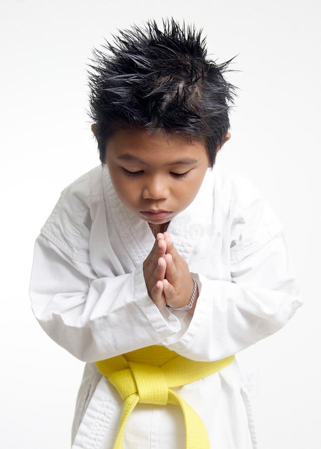 Cute Karate kid bowing stock image. Image of karate, kimono - 188377