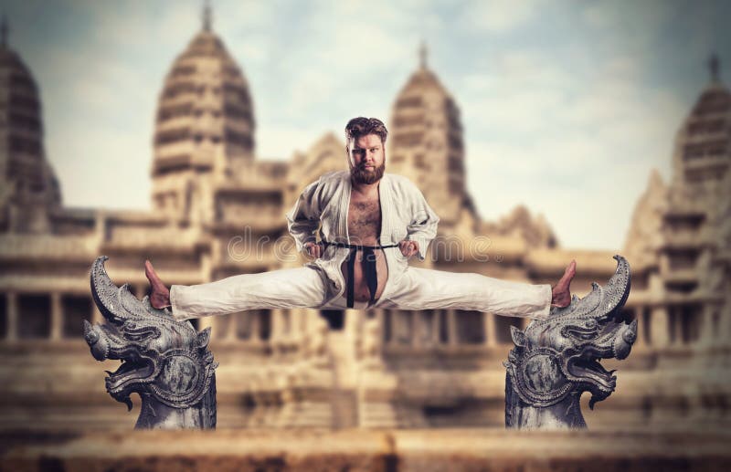 Karate Fighter Does the Splits Stock Image - Image of motion, karate ...