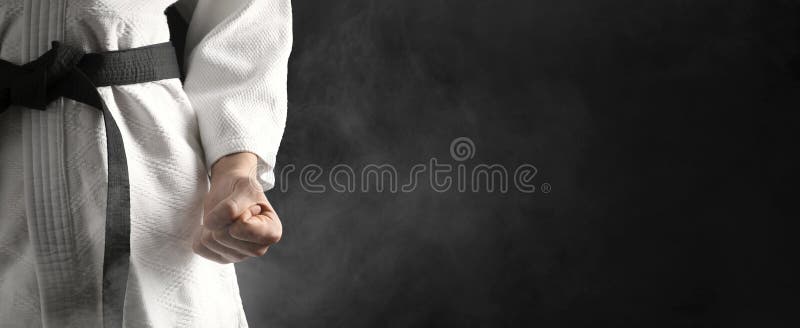 Karate Fighter in Smoke on Black Background, Closeup. Banner Design ...