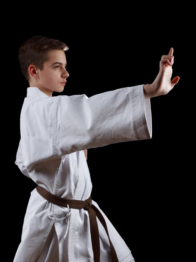 Karate Fighter in White Kimono Isolated on Black Stock Image - Image of ...