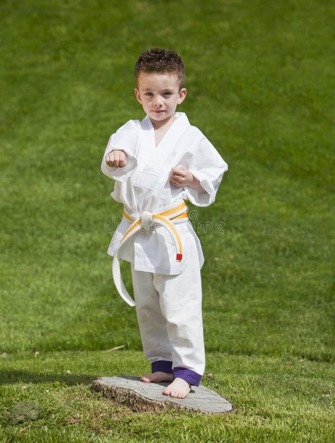 Karate kid stock image. Image of kihon, grass, defense - 21104689