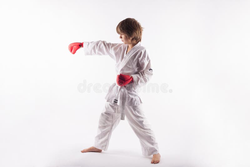 Karate Kid Wearing White Gi and Belt in a Side Split Side Straddle ...