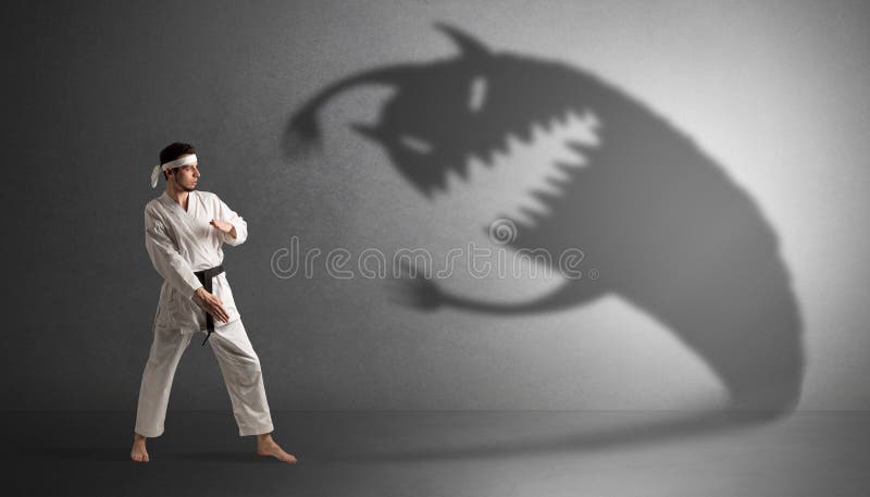 Karate Man Fighting with a Big Scary Shadow Stock Image - Image of ...