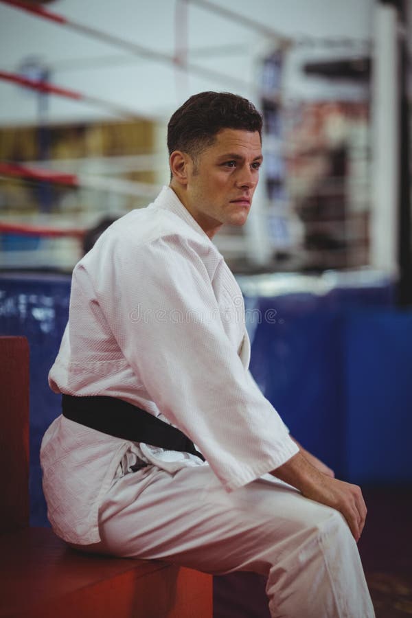 Karate Player Sitting in Fitness Studio Stock Photo - Image of club ...