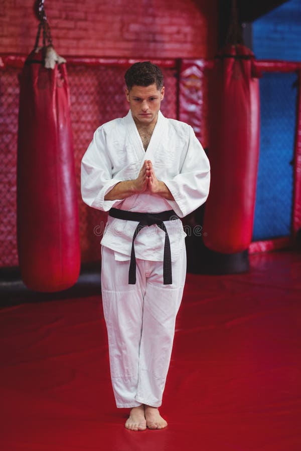 Karate Player Standing in Prayer Pose Stock Photo - Image of healthy ...