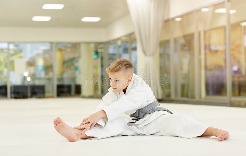 Karateka Stretching on the Floor Stock Image - Image of action, boys ...