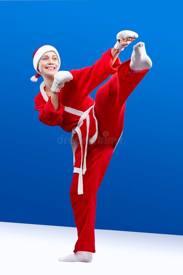Karateka in the Suit of Santa Claus Hits a Kick Leg Stock Image - Image ...