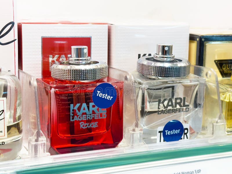 Karl Lagerfeld Perfume Display with Red and Clear Bottles and Tester ...