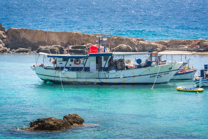 Small Fisherman Boat on Lefkos Beach in Greece Editorial Stock Image ...
