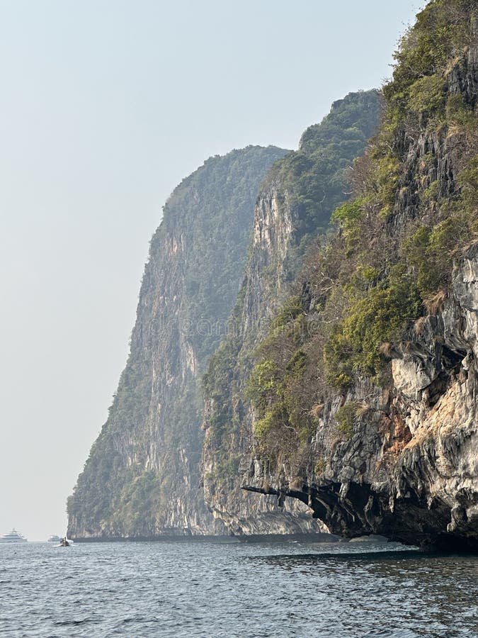 Karst cliffs and the ocean stock photo. Image of travel - 336004364