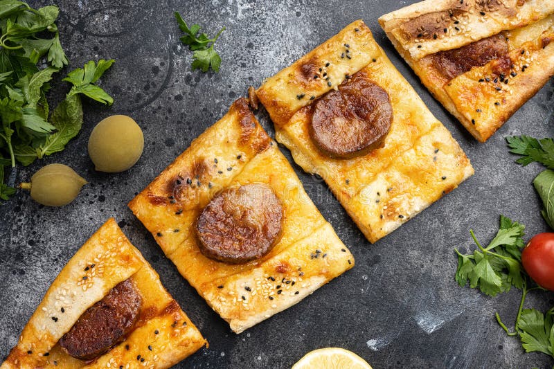 Kasarli Sucuklu Pide, on Black Dark Stone Table Background, Top View ...