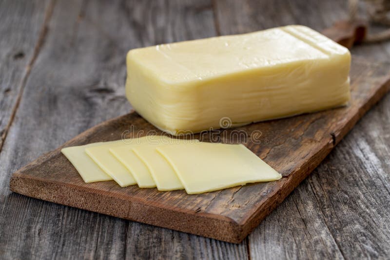 Kashar Cheese or Kashkaval Cheese on Wood Floor. Stock Photo - Image of ...