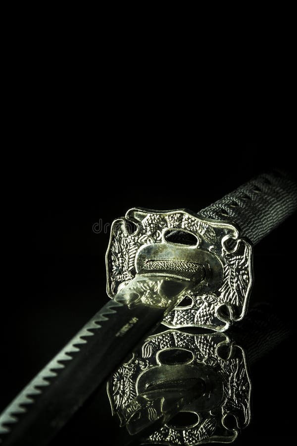 Katana Sword on a Black Background and Reflective Table Stock Image ...