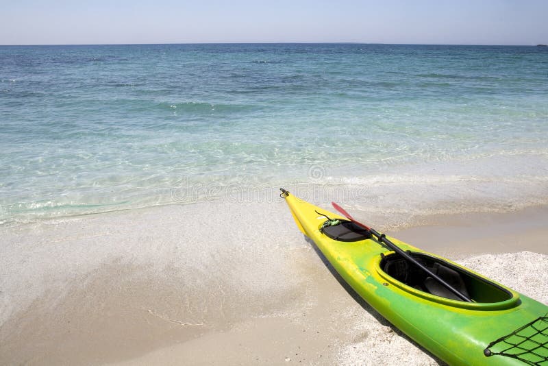 Kayak on the beach stock photo. Image of sardinia, clouds - 10698736