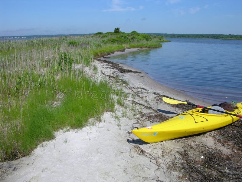 Kayak Resting on the Shore of Ninigret Pond Stock Image - Image of ...