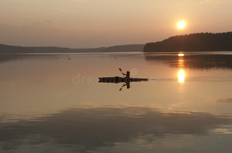 Kayak in the sunset stock image. Image of woman, paddle - 20363457