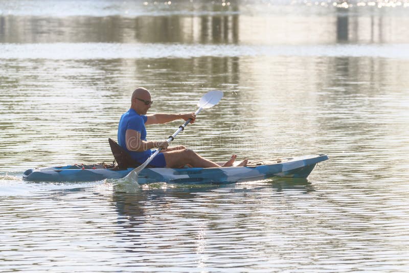Kayaker Man Paddle Kayak. Kayaking, Paddling, Canoeing Stock Image ...