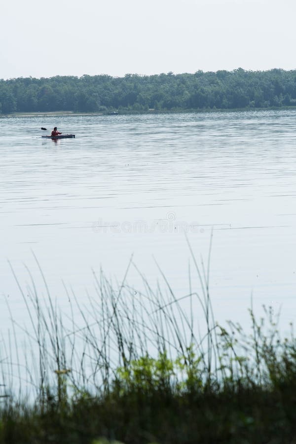 Kayaker Rowing on Lake Michigan Stock Photo - Image of natural, sandy ...