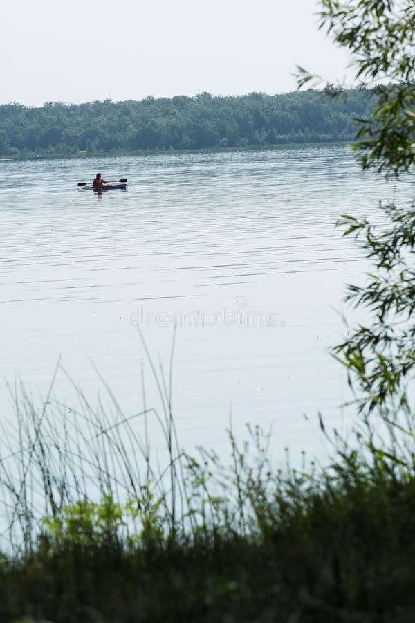 Kayaker Rowing on Lake Michigan Water Stock Image - Image of flops ...