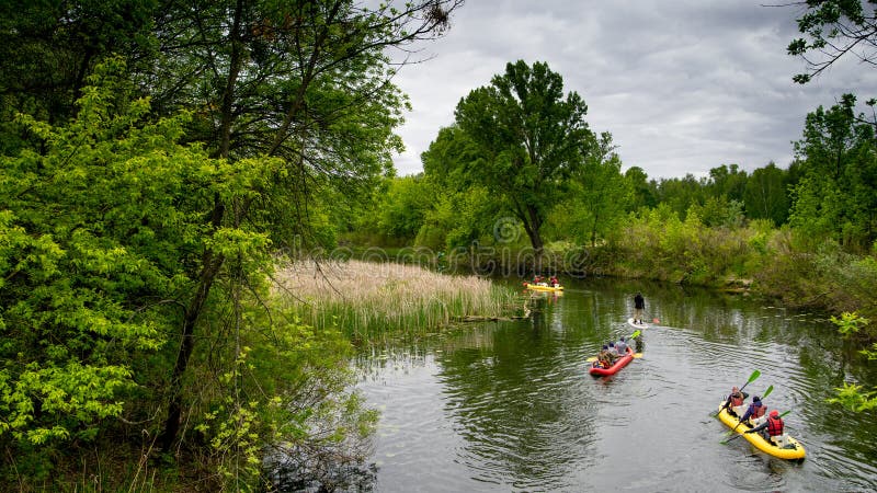 Kayaking on the River. Several Kayaks with Teams on Board Stock Image ...