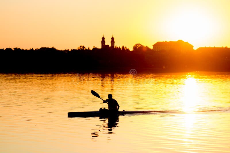 Kayaking at sunset stock photo. Image of kayak, activity - 42705578