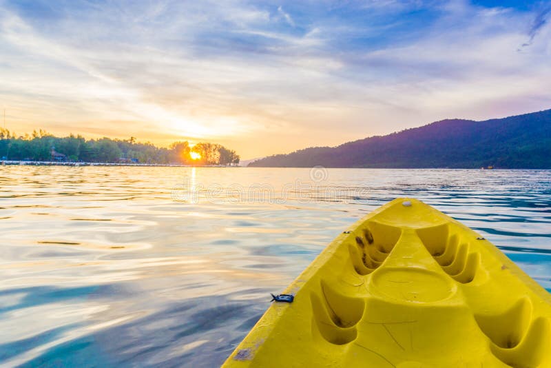 Kayaking at the Tropical Beach with Beautiful Sunset Stock Photo ...