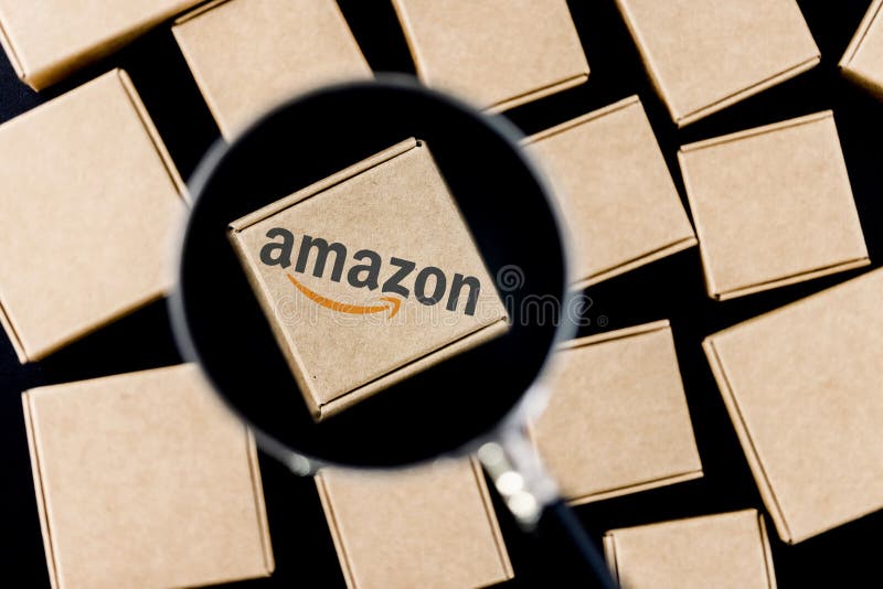 Modified Photo of Amazon Logo on a Box Under a Magnifying Glass ...