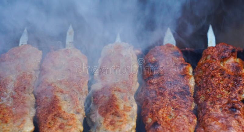 Kebab is Being Cooked on the Fire Stock Photo - Image of food, coal ...
